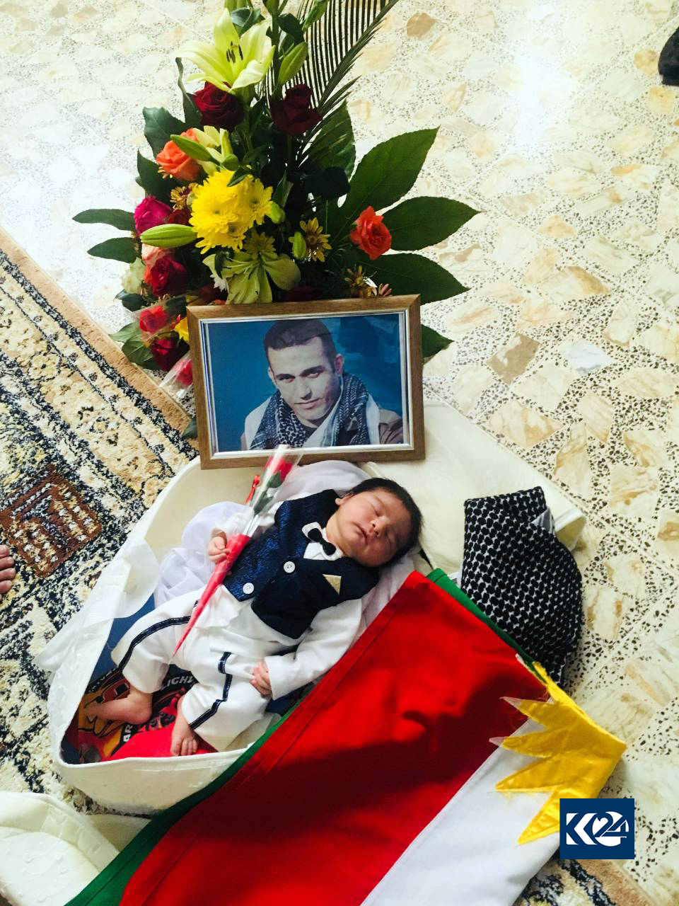 PHOTOS: Scarf of executed Kurdish activist given to newborn baby named ...